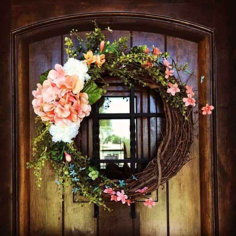 Get inspiration here to make 20 Affordable Spring Wreaths and Garlands.