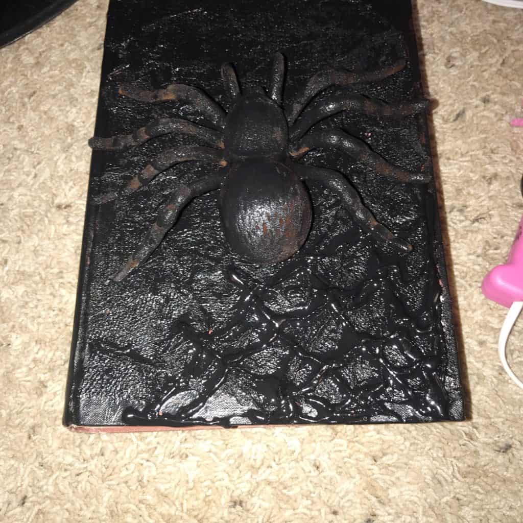 Learn How To Make This Spooky DIY Spell Book Halloween Craft.